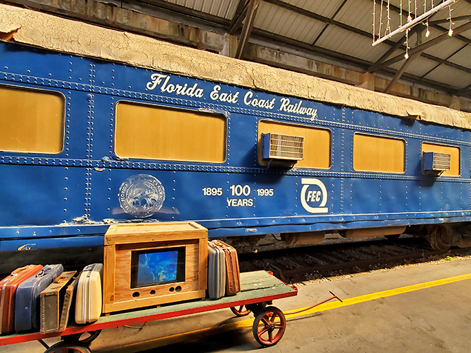 The Florida East Coast Railway's century of service is celebrated on this blue and yellow bunk car, where railroad workers once caught their precious sleep.