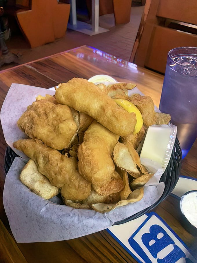 Golden-fried fish fingers that would make Captain Birds Eye weep with jealousy, served in a basket that says "vacation" in every crispy bite.