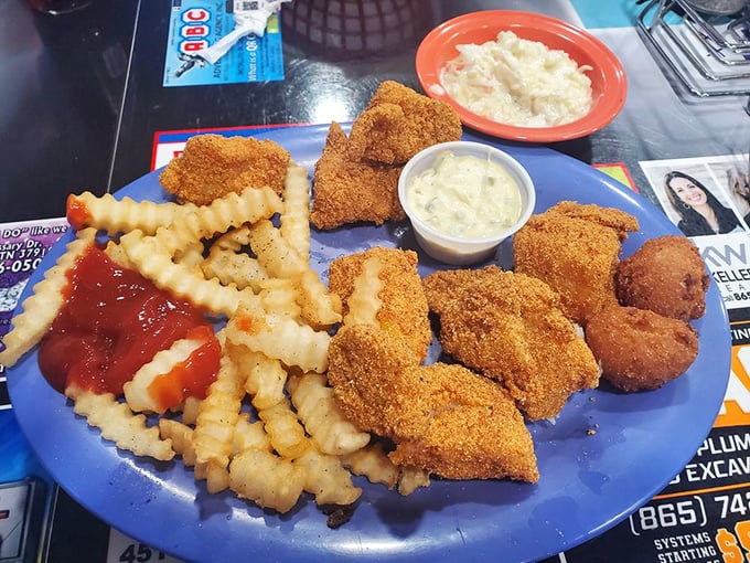 Golden-fried chicken tenders that shatter at first bite, paired with crinkle-cut fries. Comfort food engineering at its finest.
