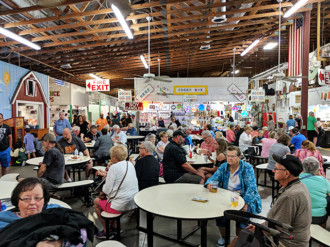 The food court: where shopping stamina gets replenished and strangers become temporary dining companions united by the thrill of the bargain hunt.