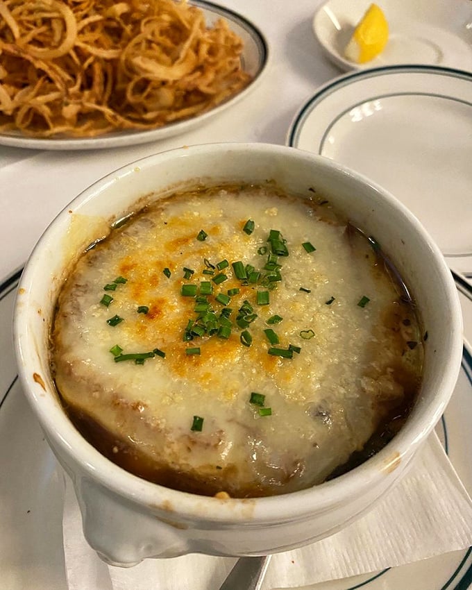 French onion soup that's had a proper education&mdash;deeply caramelized onions in rich broth under a canopy of melted cheese that stretches with each spoonful.