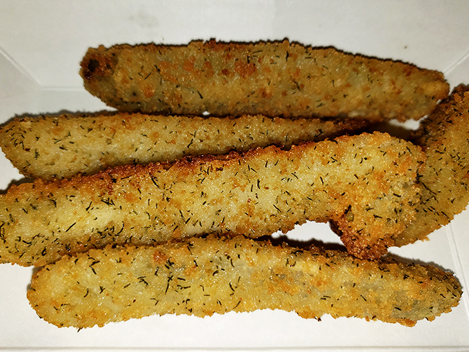 Fried pickles with just the right amount of herby breading&mdash;crunchy, tangy perfection that disappears from the basket with suspicious speed.