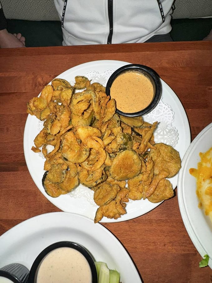 Fried pickles: proof that anything becomes magical when breaded and introduced to hot oil. That dipping sauce deserves a Nobel Prize in chemistry.