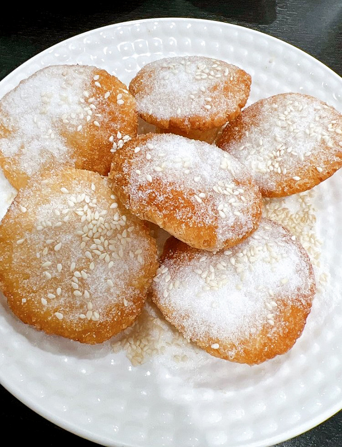 These powdered sugar-dusted fried rice cakes are what donuts dream of becoming when they grow up&mdash;crisp, tender, and utterly irresistible.