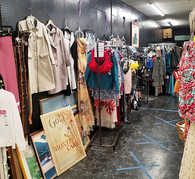 Vintage fashion time capsules hang in perfect rows. These aren't just secondhand clothes &ndash; they're wearable history with stories stitched into every seam.