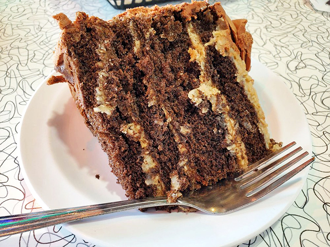 A slice of German chocolate cake that would make Berlin proud. Layer upon layer of cocoa bliss with creamy frosting in between.