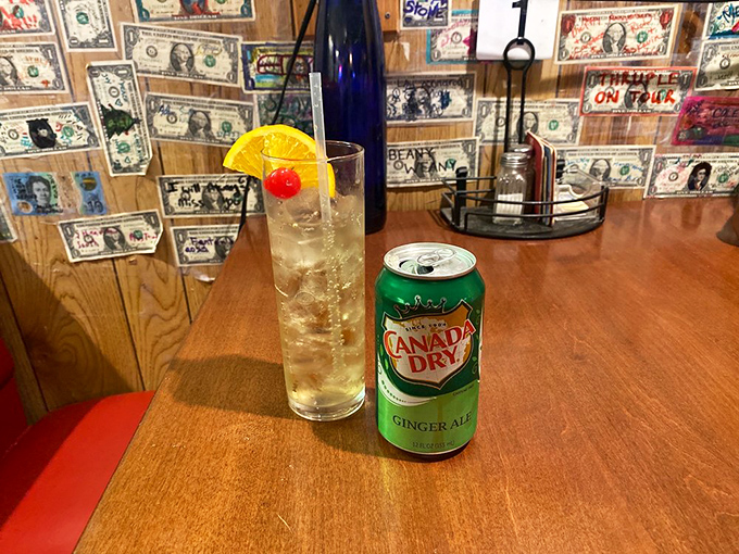 Even the drinks at Ski Inn have personality &ndash; this ginger ale and highball setup against the backdrop of dollar-decorated walls feels like America in a glass.