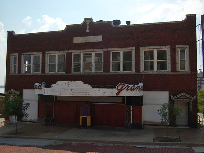The Grand Theater's faded marquee hints at entertainment eras past, awaiting a second act while still adding character to Alton's streetscape.