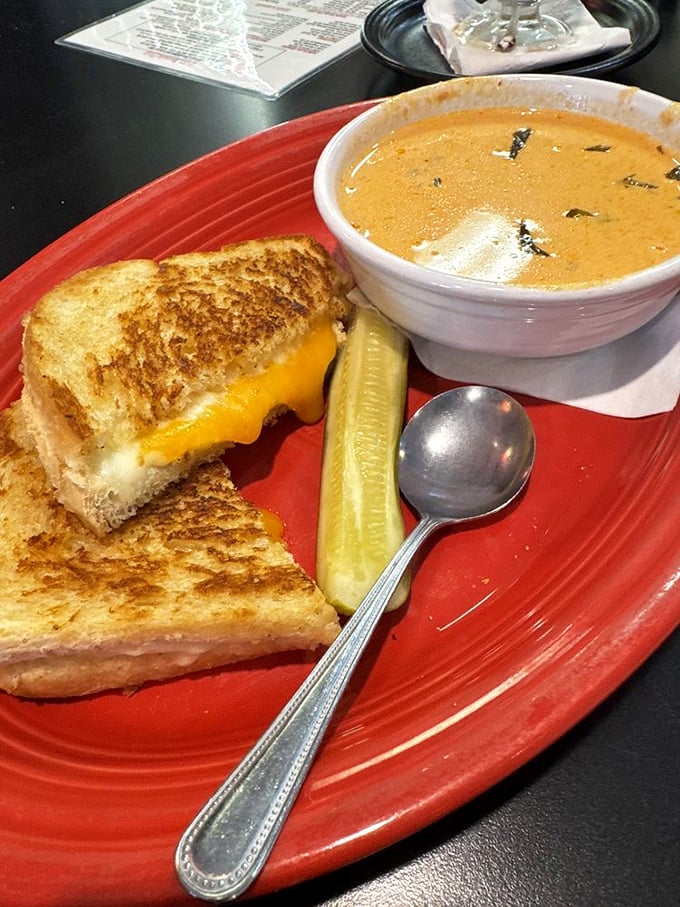 Grilled cheese and soup&mdash;childhood's perfect pairing all grown up. That cheese pull could win Olympic medals for both distance and form.