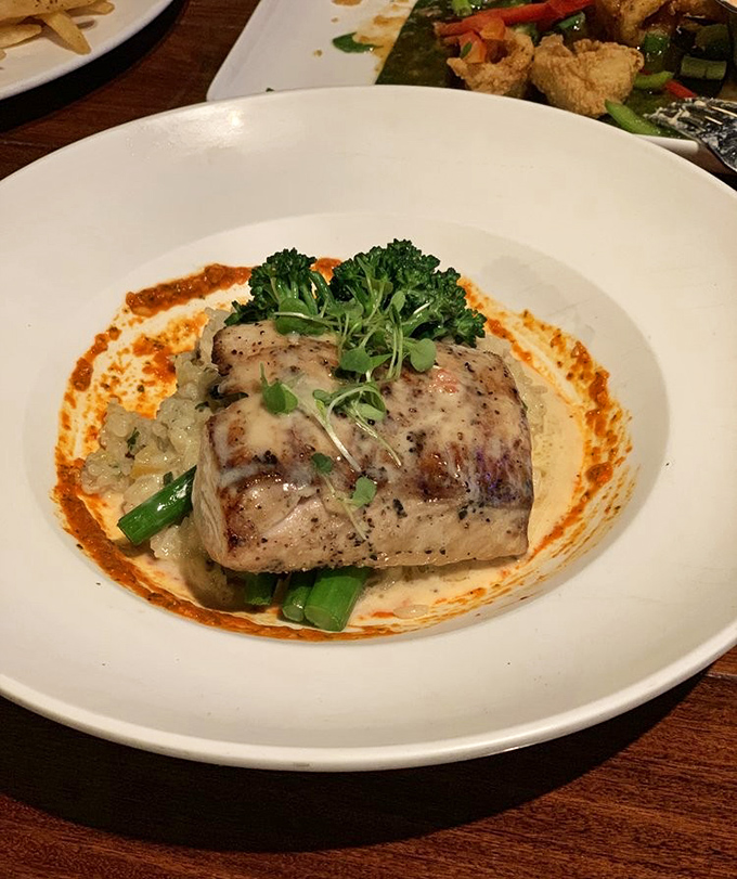 Grilled mahi mahi presented like a masterpiece, proving that simple preparation often yields extraordinary results.