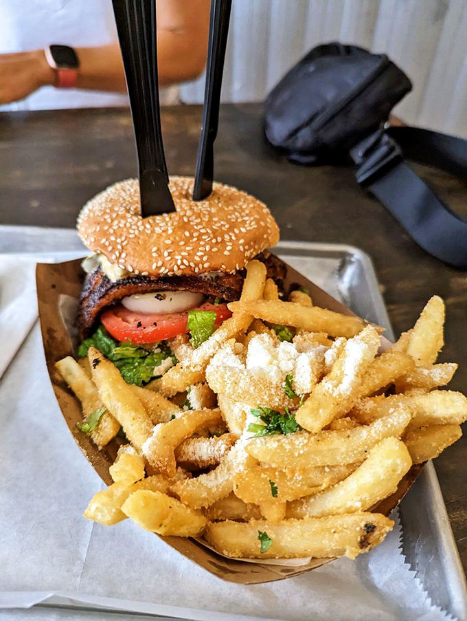 The burger's seafaring cousin arrives with attitude. This blackened grouper sandwich with all the fixings is why napkins were invented.