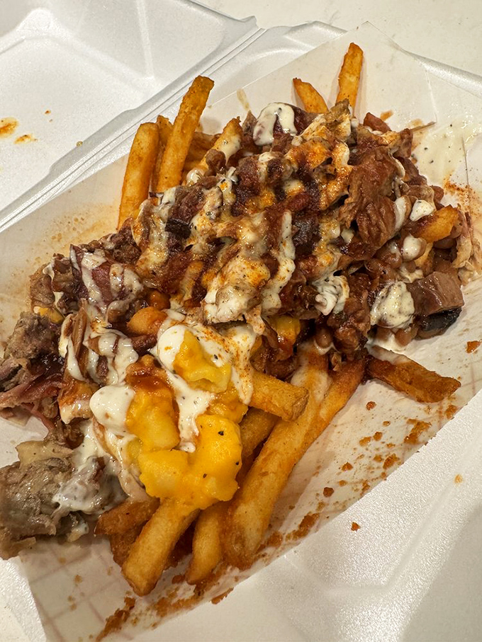 Behold the Hoffanator: a mountain of meat on a bun that requires both hands, several napkins, and absolutely zero regrets.