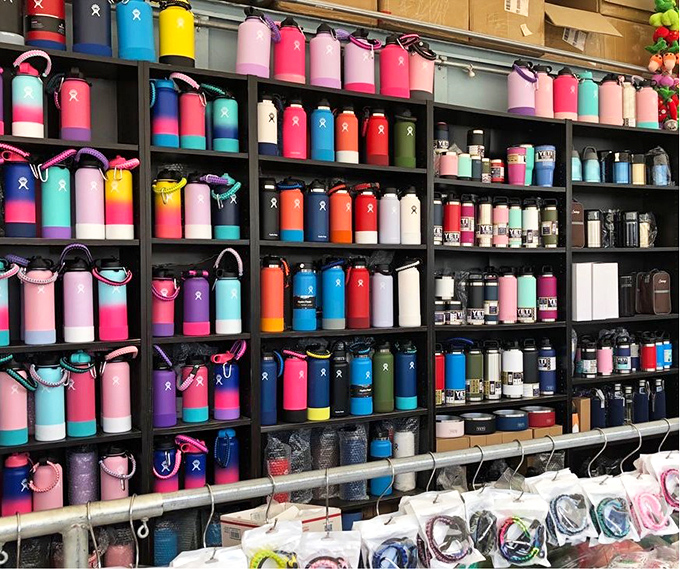 Hydration station chic! The water bottle wall that makes staying hydrated look like a fashion statement.