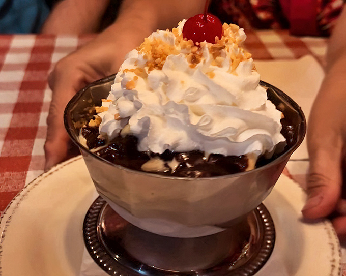 Hot fudge sundae architecture at its finest. The cherry on top isn't just garnish&mdash;it's the exclamation point on a sweet sentence.