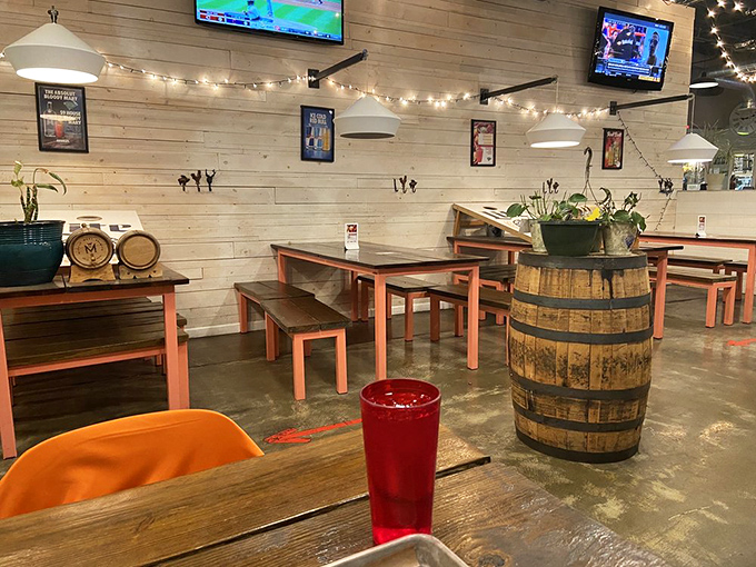 String lights and barrel tables transform this industrial space into somewhere you'd happily spend hours debating the merits of different BBQ regions.