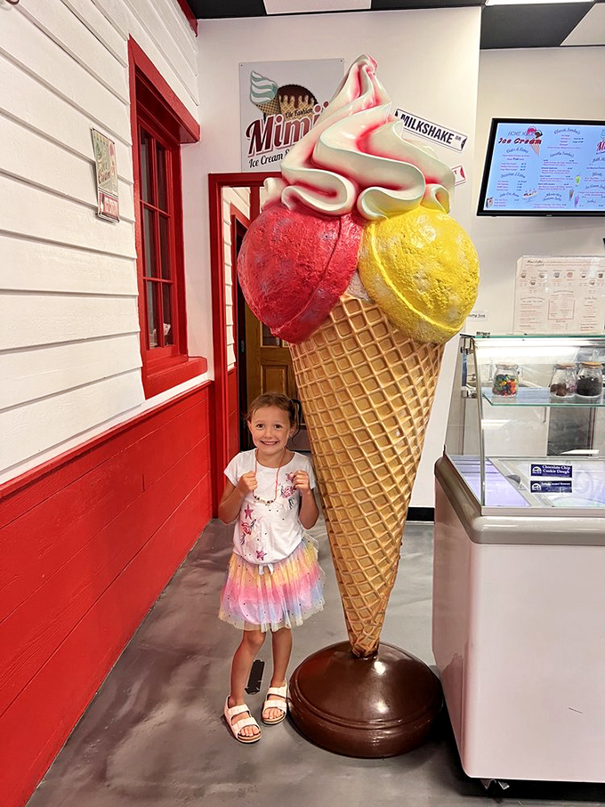 Ice cream paradise revealed: gleaming display cases filled with frozen treasures that make adults forget about things like "moderation" and "cholesterol."