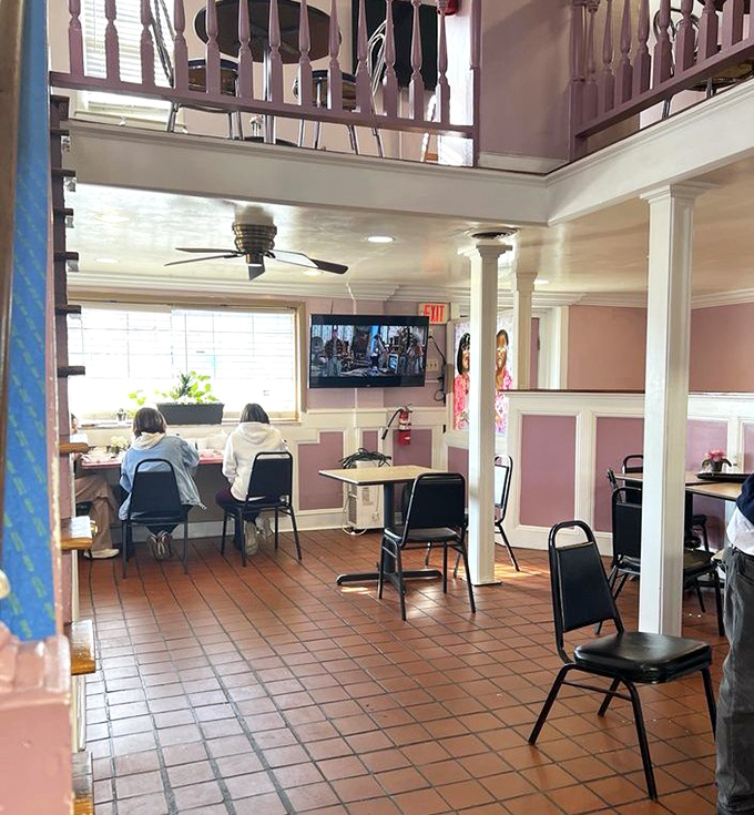 The two-story dining room feels like Sunday dinner at grandma's—if grandma could feed a small army and had impeccable taste in paint colors.