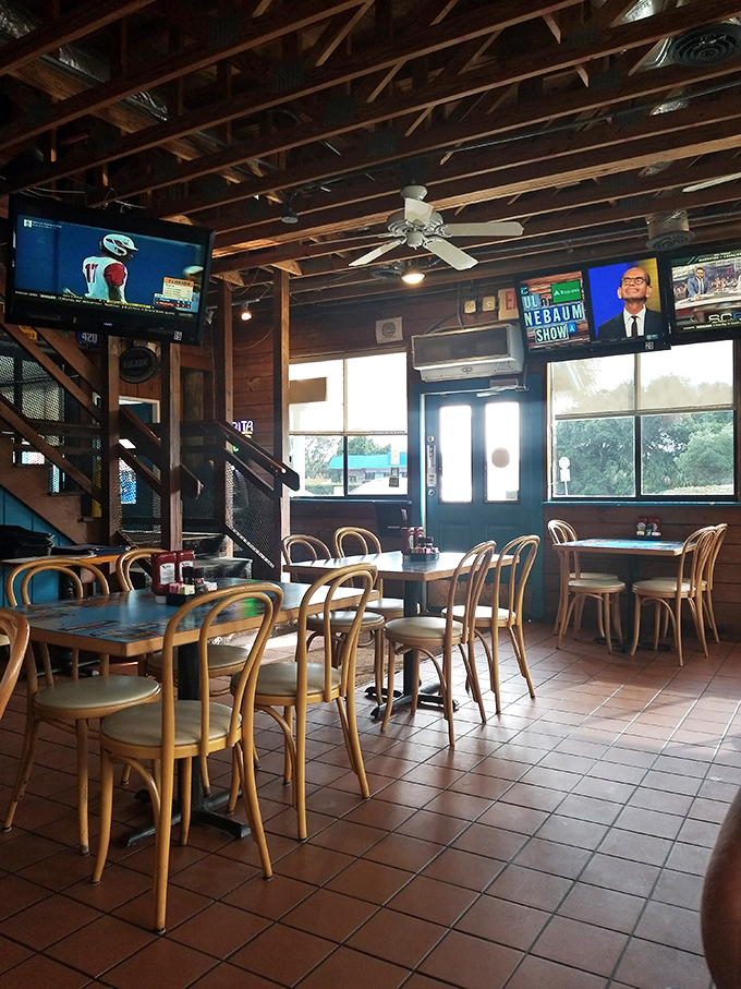 Another angle reveals the restaurant's casual charm &ndash; where TVs show the game but nobody's really watching because the food demands full attention.