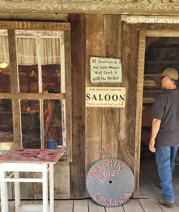 "All Gunslingers And Loose Women Must Check In With The Marshal." Finally, a dress code I can understand without reading the fine print. 