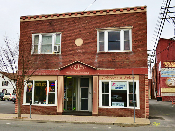 Small-town storefronts like this brick building house local businesses where your dollar supports neighbors, not distant corporate headquarters.