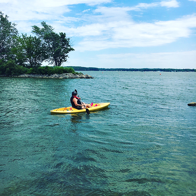 Crystal clear waters and a bright yellow kayak&mdash;the perfect recipe for adventure. Lake Erie showing off its Caribbean-blue credentials on a perfect summer day.
