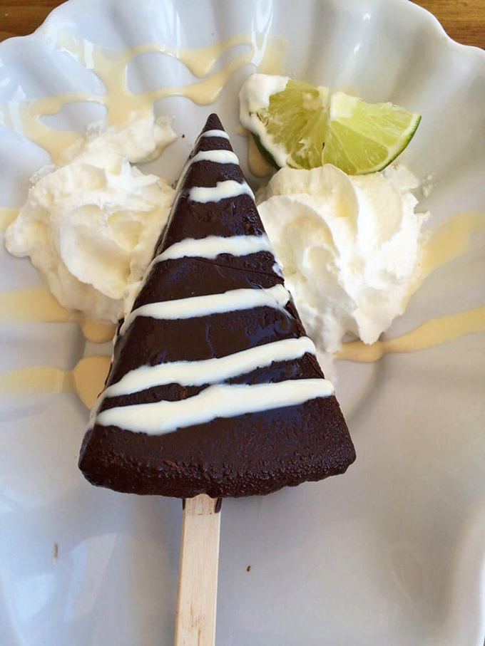 This key lime pie on a stick isn't just dessert—it's a tropical vacation that fits perfectly between your thumb and forefinger.