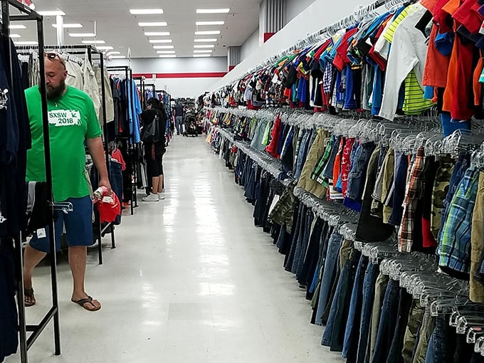 The men's section: where shoppers navigate a canyon of clothing while contemplating whether that SXSW shirt is ironically cool or just dated.