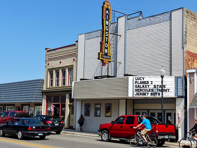 The Kingston Theatre's vintage marquee promises entertainment the old-fashioned way&mdash;without subscription fees or buffering issues.