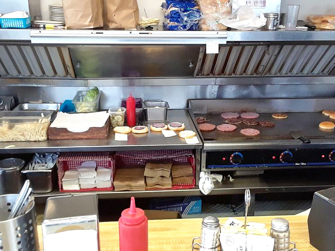 Where the magic happens. That well-seasoned grill has probably seen more action than most Hollywood stuntmen.