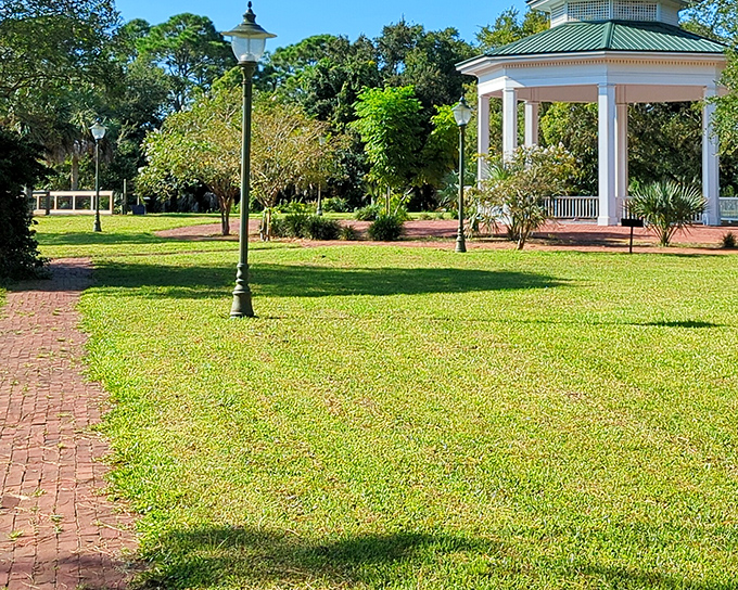 Lafayette Park's gazebo beckons beneath towering trees, offering a shaded sanctuary where wedding vows and picnic promises are equally sacred.