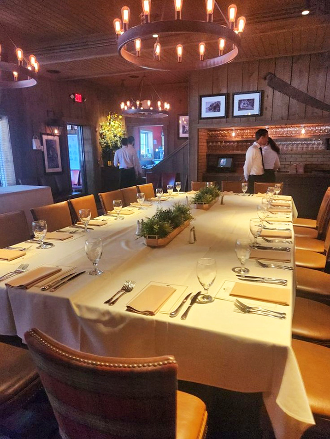 A private dining table set with the kind of precision that suggests whatever's about to happen here is worth documenting for posterity.