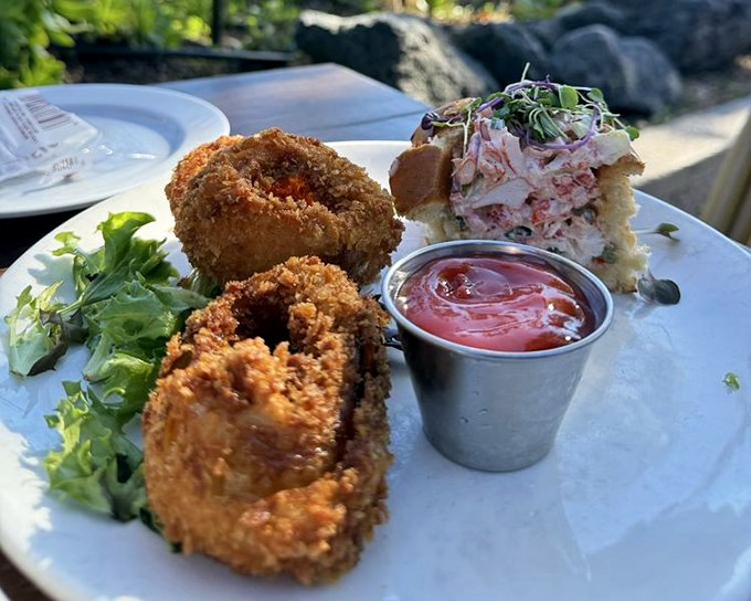 A lobster roll so generously stuffed, it practically requires an engineering degree to eat without making a mess.