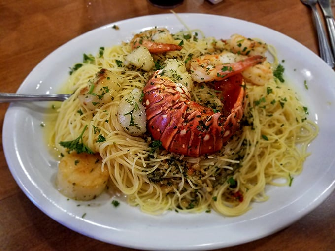 Lobster scampi that proves pasta is really just a vehicle for delivering buttery, garlicky seafood straight to your happiness center.