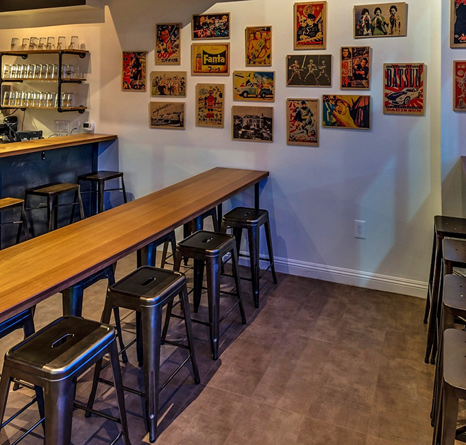 Vintage pop culture posters line the walls, giving diners something to discuss between bites of burger bliss and sips of craft beer.