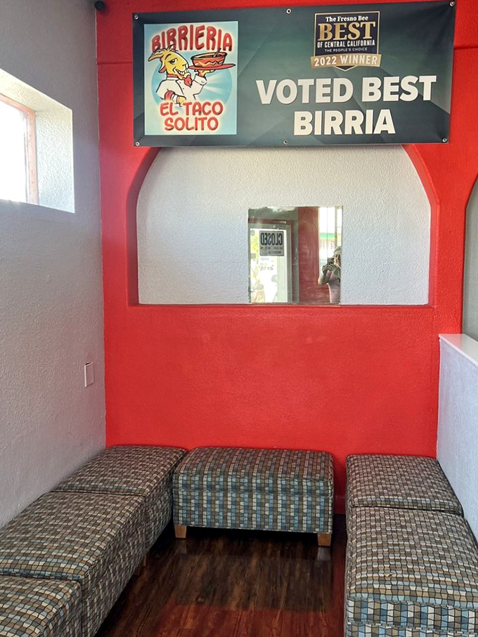 The waiting area speaks volumes—just enough comfort to make you patient, but not so much that you'll linger when others are hungry too.