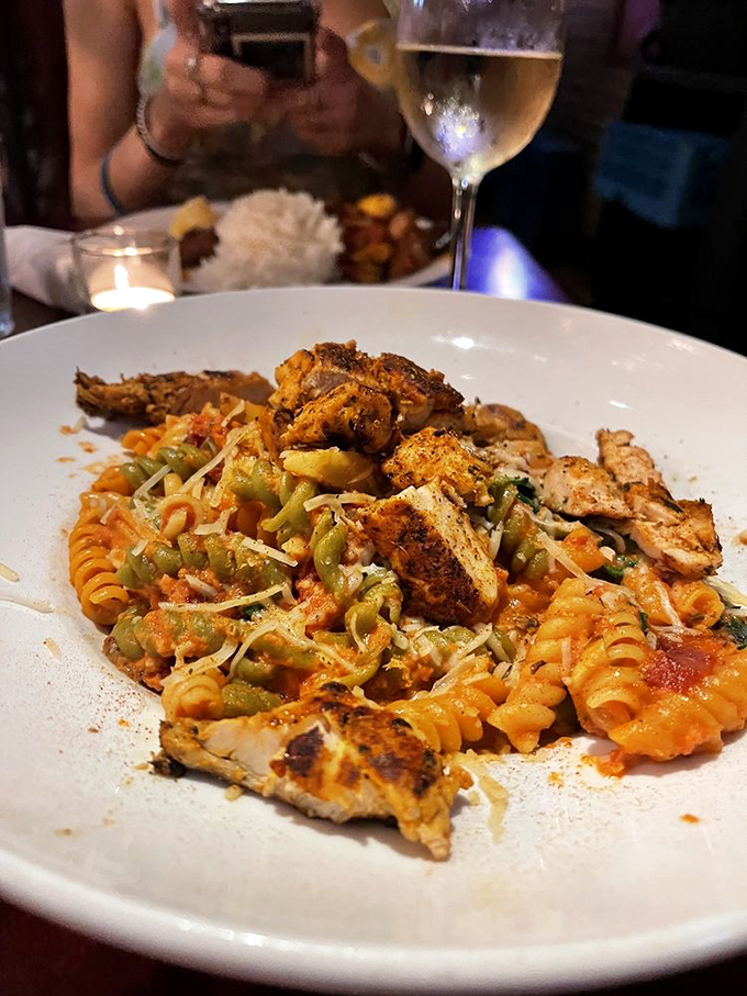 Mardi Gras Pasta bringing the party to your plate with colorful vegetables and blackened chicken. Carbs have never looked so festive or worth the indulgence.