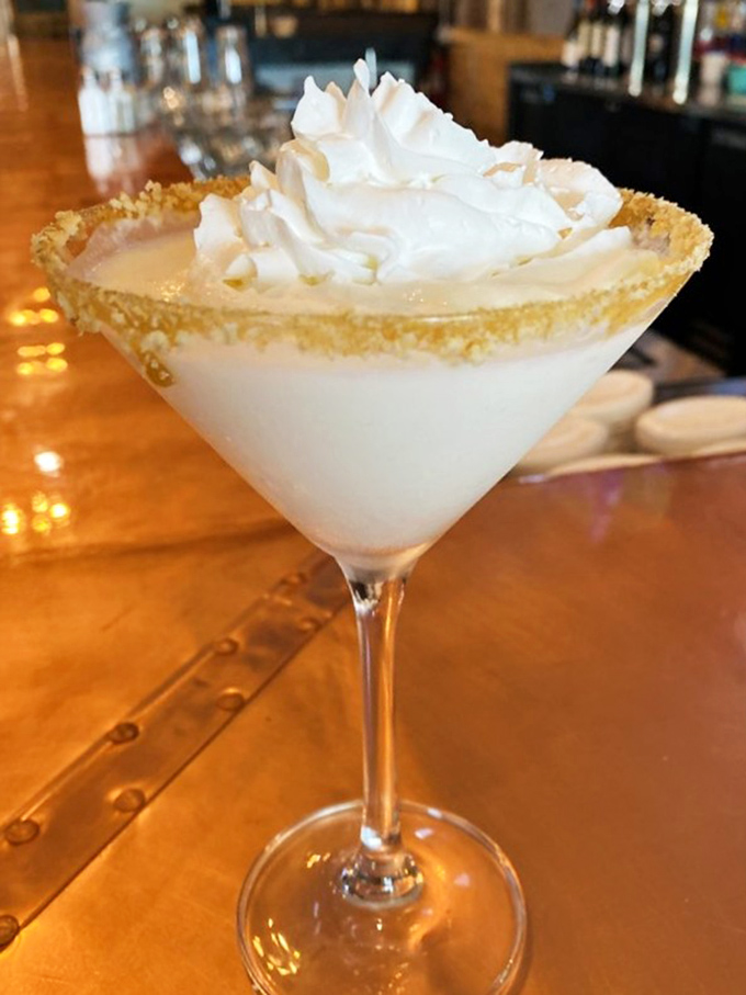 A dessert martini that's dressed better than most people at formal events. The graham cracker rim is the edible jewelry this cocktail deserves. 