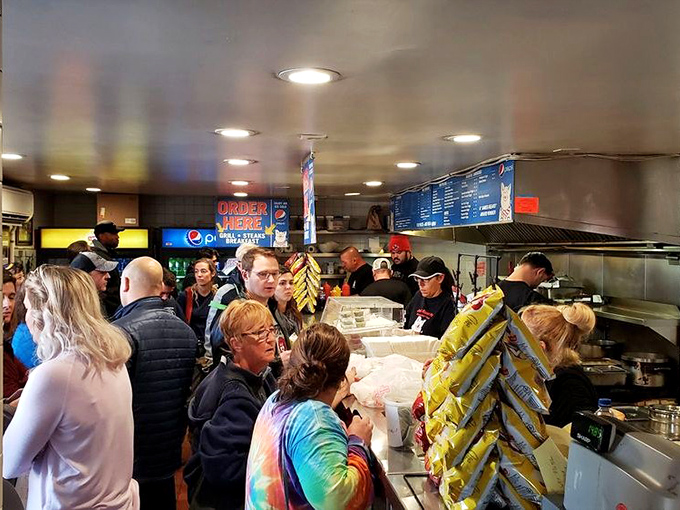 The line forms with purpose&mdash;strangers united by a common mission to experience what might be the best sandwich day of their lives.