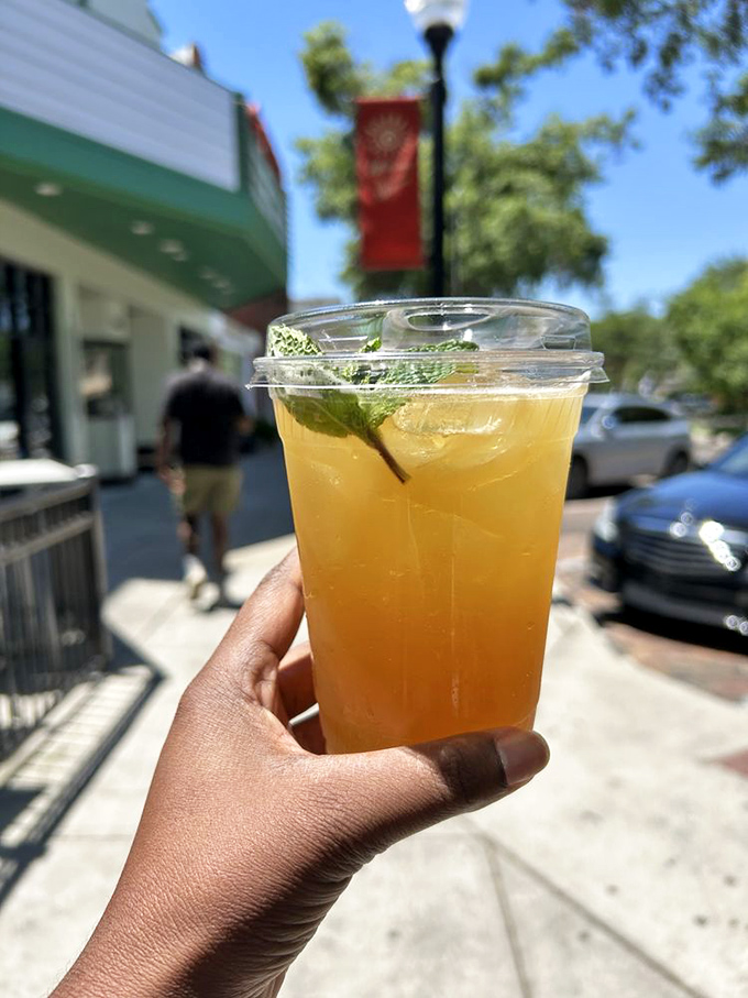 Holding liquid sunshine against the backdrop of Winter Garden's historic downtown &ndash; summer in a cup.