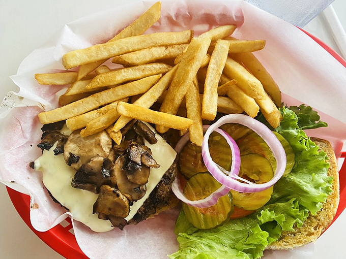 The Mushroom Swiss Burger showcases how simple ingredients can create something absolutely extraordinary when done with care.