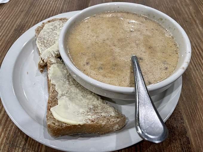 This mushroom soup looks like it could cure whatever ails you&mdash;velvety, earthy, and practically begging for that bread to take a dip.