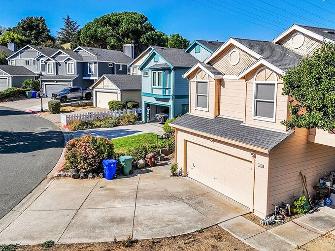 Crockett's neighborhoods feature homes in cheerful hues that would make a box of crayons jealous&mdash;practical works of art with garages.