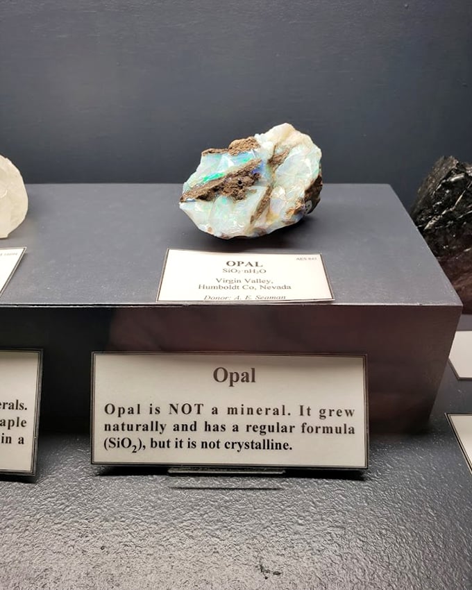 Not just a gemstone but a scientific rebel—this opal defies mineral classification while flashing colors that would make a peacock jealous.