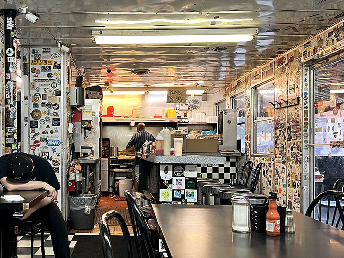 The open kitchen dance: where short-order cooks perform breakfast ballet with spatulas as their magic wands.