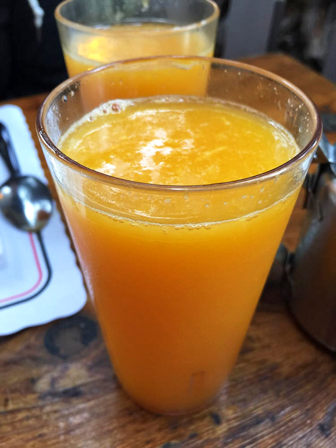 Freshly squeezed orange juice that tastes like California sunshine in a glass &ndash; bright, vibrant, and worth every pulpy sip.