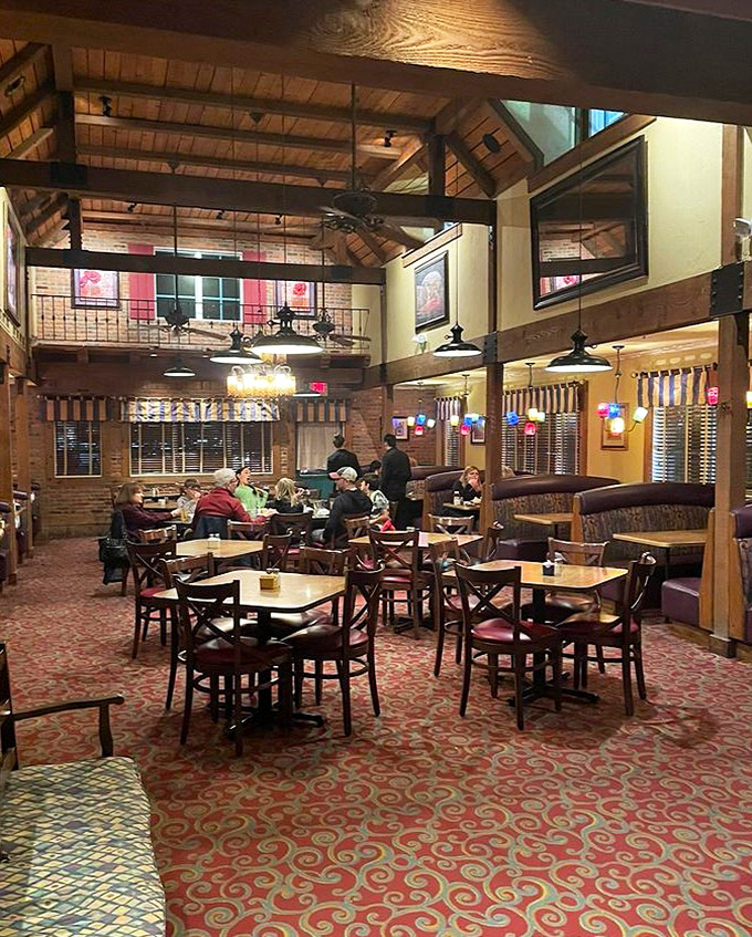 Soaring ceilings and rustic beams make this dining room feel like the farmhouse of your dreams—if your dreams included professional chefs and no dishes to wash.