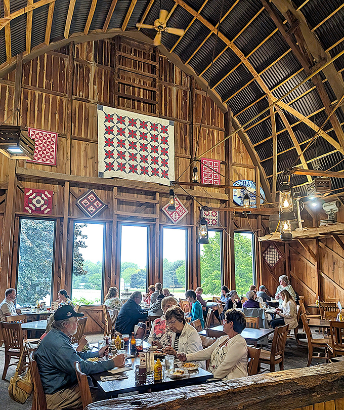 Handcrafted quilts adorn walls that have witnessed countless celebrations. The windows frame the Ohio countryside like living paintings.