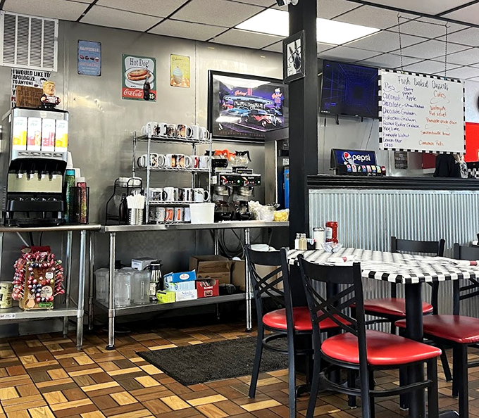 Vintage signs and coffee station&mdash;the beating heart of diner culture. Where mugs are always full and nostalgia flows freely.