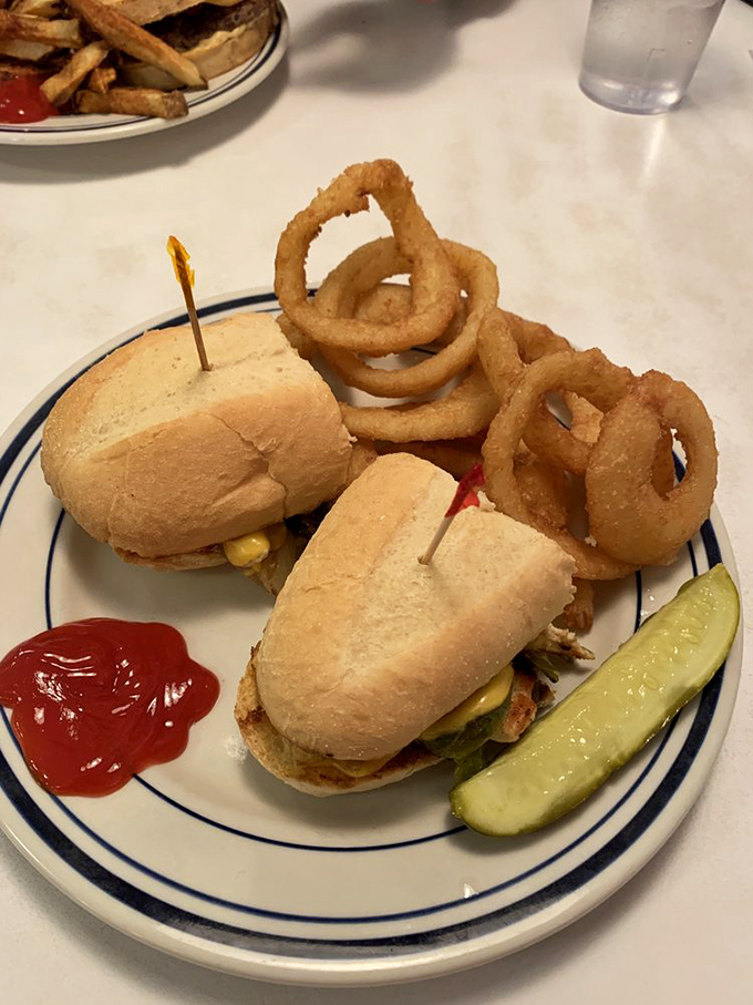 Sliders and onion rings that don't just satisfy hunger&mdash;they abolish it, with a pickle spear standing guard to cut through all that delicious richness.