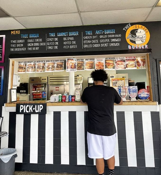 The black and white tiled pick-up counter feels like a chess board where every move ends with you winning delicious food.